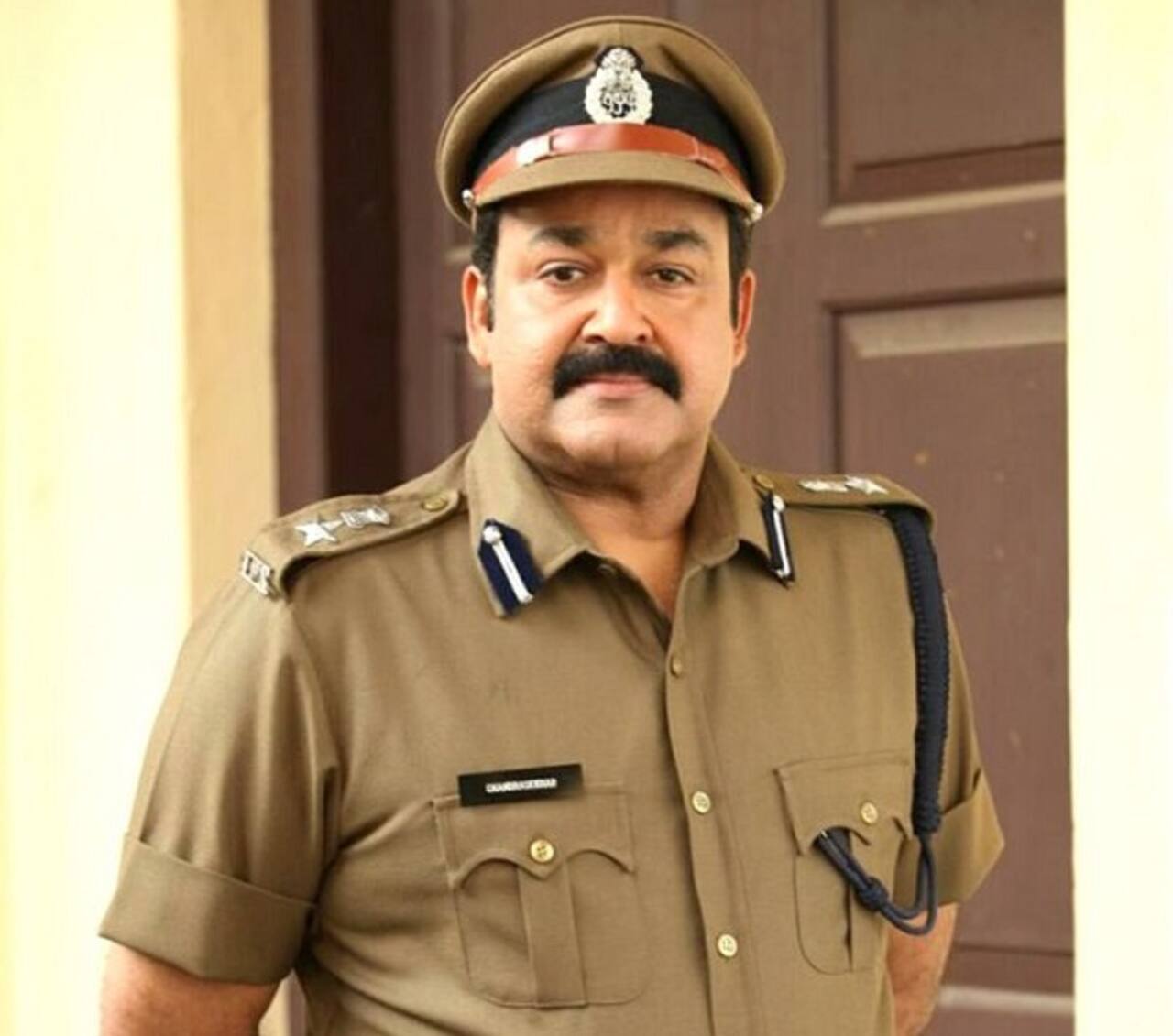 Mohanlal returns to Telugu cinema as a tough cop! - Bollywood News ...