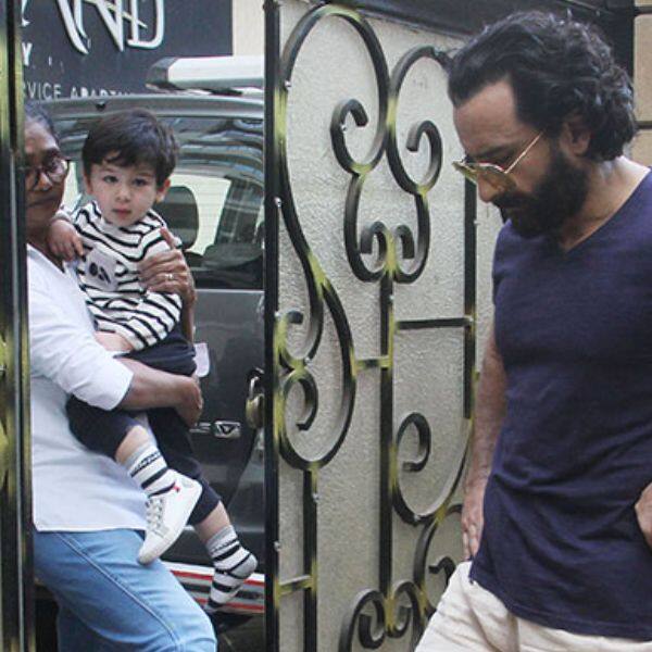 [HQ Pics] After his regular piggyback ride, Taimur is out for a stroll ...