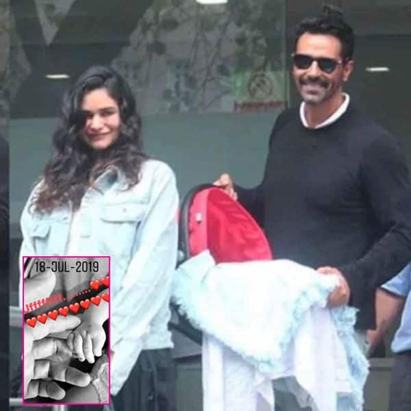 Aww! Arjun Rampal's infant holds daddy's hand and the proud parents ...