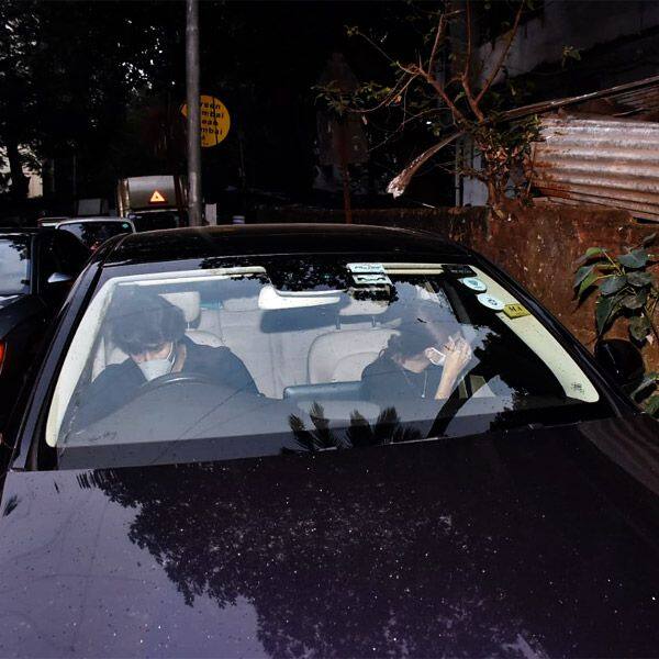 Tara Sutaria hides her face from the paps while beau Aadar Jain runs an ...