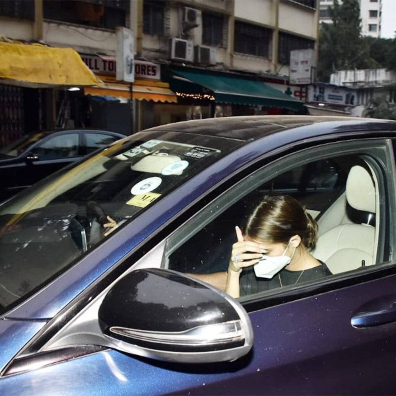 Tara Sutaria hides her face from the paps while beau Aadar Jain runs an ...