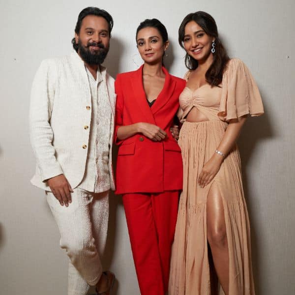 Neha Sharma flaunts her tone physique in red crop top; poses for camera