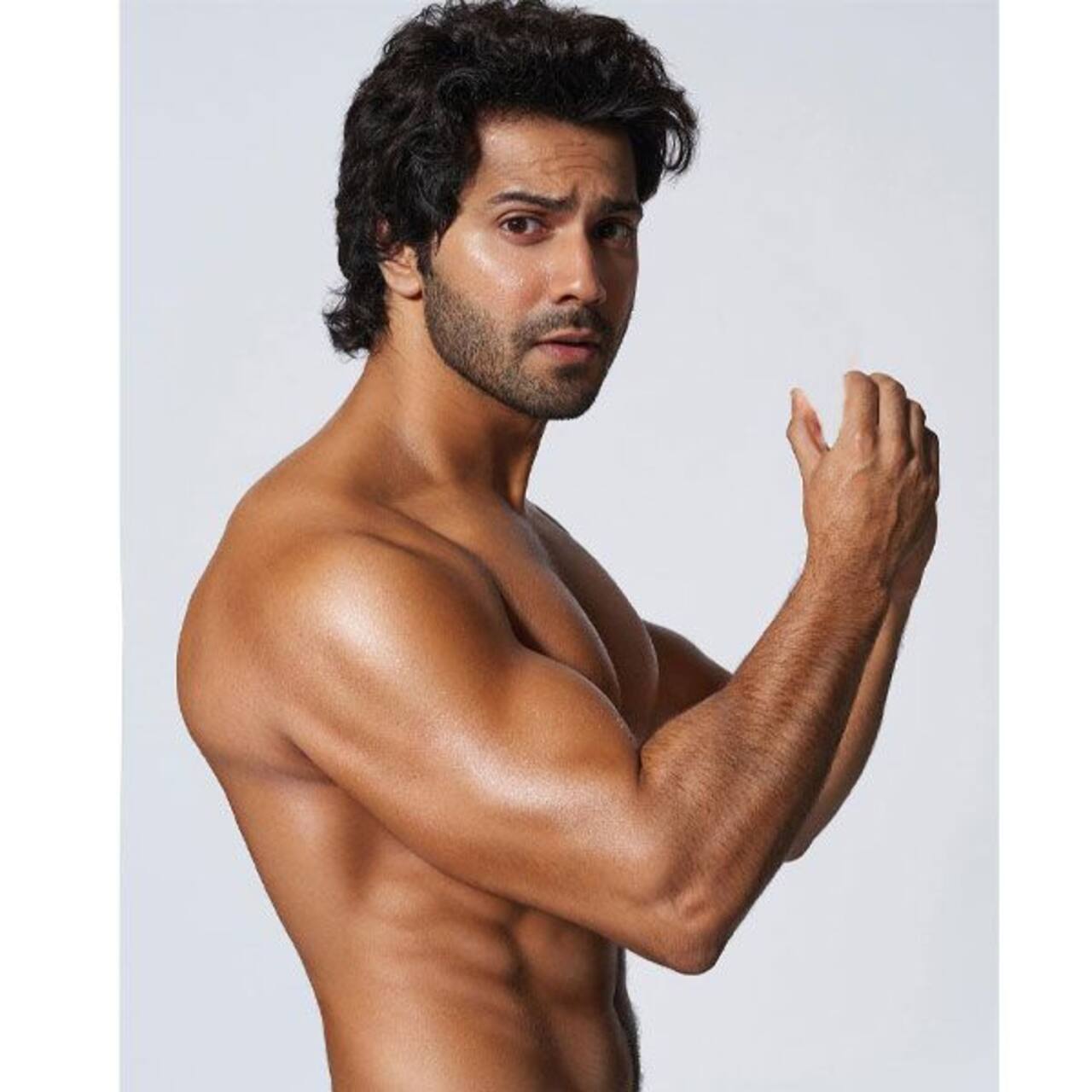 Varun Dhawan flaunting his rock-hard pecs and six-pack abs are the stuff that shirtless dreams ...