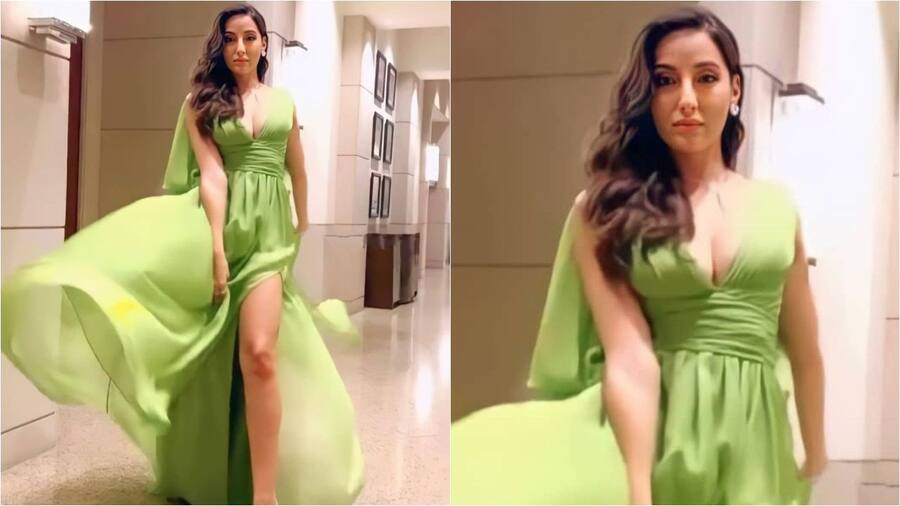 Nora Fatehi shows off her enviable CURVES in a thigh-high slit gown ...
