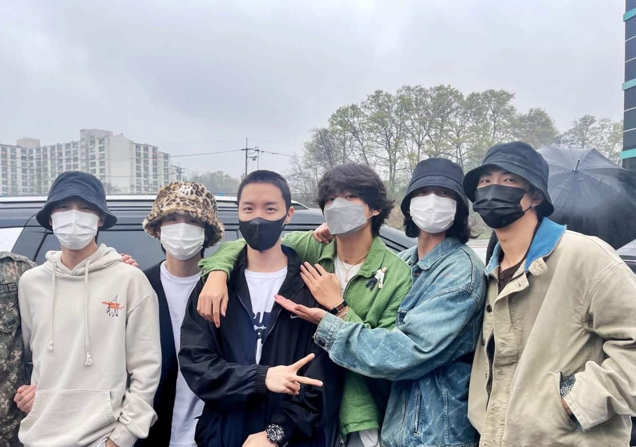 BTS REUNITES on a rainy day to bid farewell to J-Hope as he enlists in ...