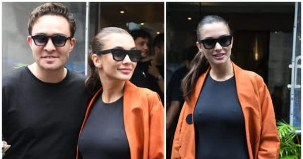 Amy Jackson has an oops moment as she poses stylishly for paparazzi ...