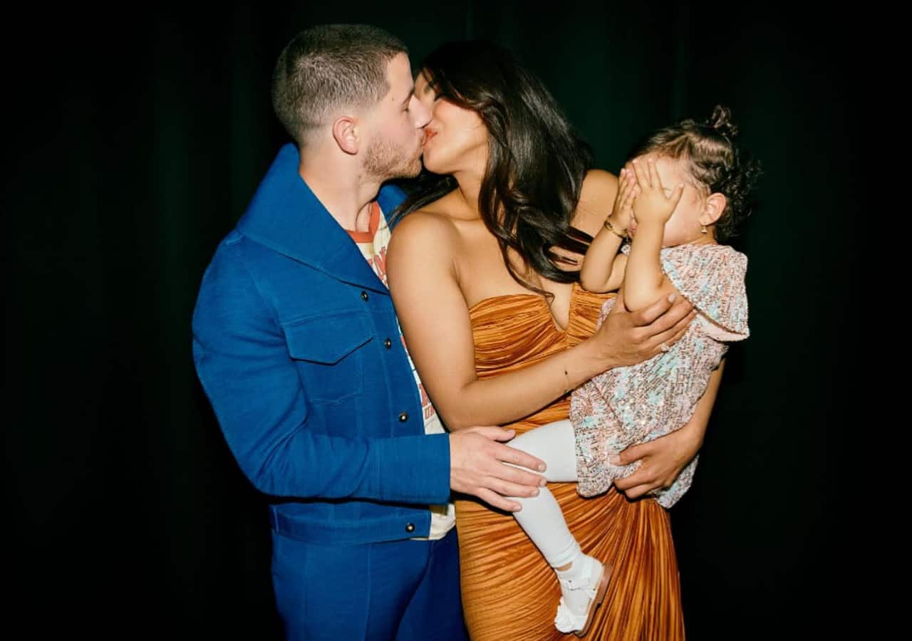 Priyanka Chopra, Nick Jonas lock lips as Malti Marie covers her eyes in this Oh So Romantic moment