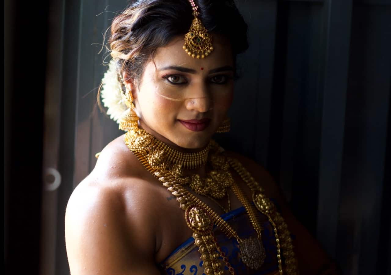 beauty with muscle: bodybuilder chitra purushottam bride look in gold ...