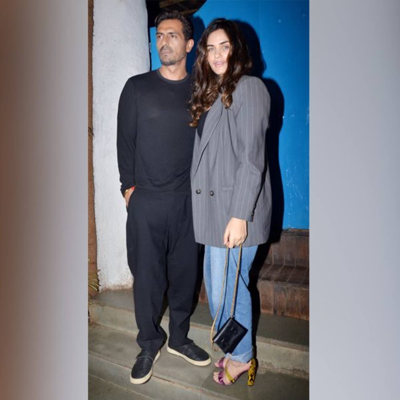 Happy parents Arjun Rampal and Gabriella Demetriades arrive together ...