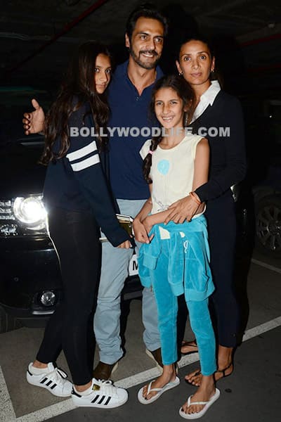 Aww! Arjun Rampal KISSES wife Mehr Jessia openly at Mumbai airport