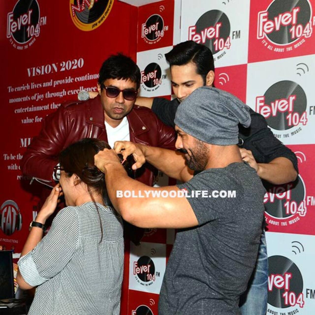 Varun Dhawan and John Abraham promote ‘Dishoom’ at Fever 104 FM studio ...