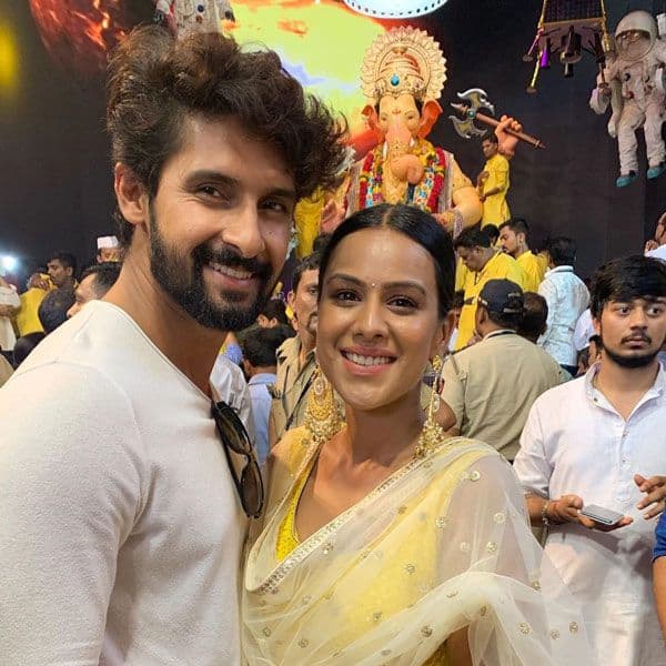 Jamai Raja 2.0 lead pair Nia Sharma and Ravi Dubey pray at Lalbaughcha ...