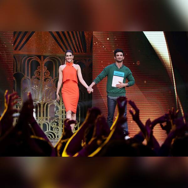 Sushant Singh Rajput and Kriti Sanon walk hand-in-hand as they head for ...